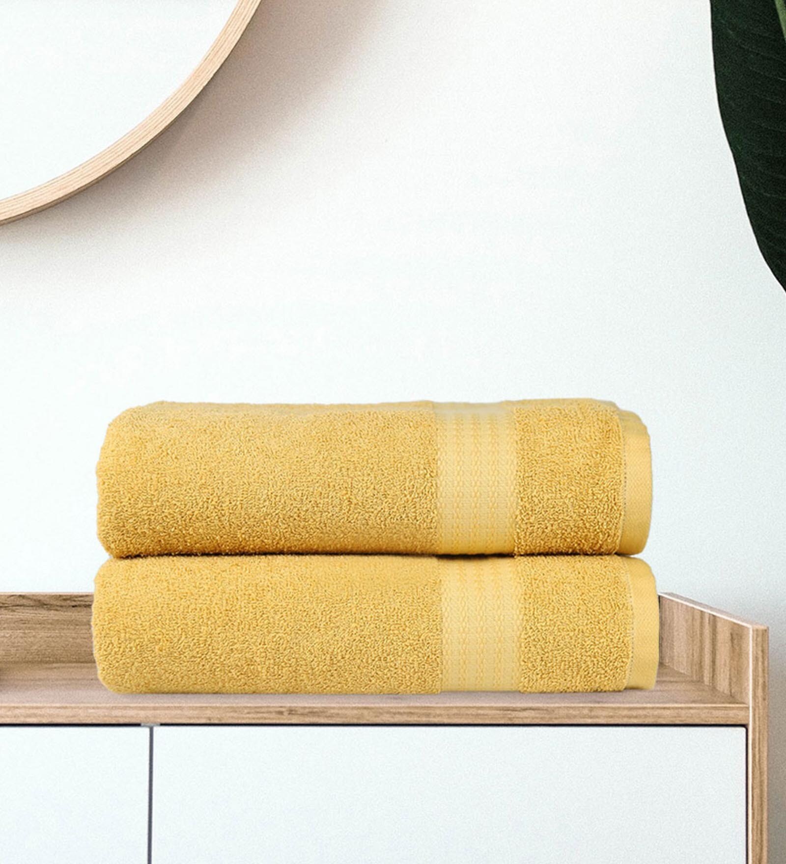 Buy Yellow Solid 400 GSM Cotton Bath Towels (Set of 2) by Trident at 14 ...